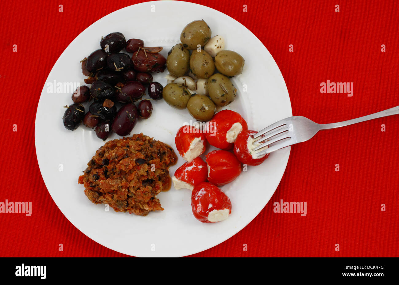 olives, pepper on the plate Stock Photo - Alamy
