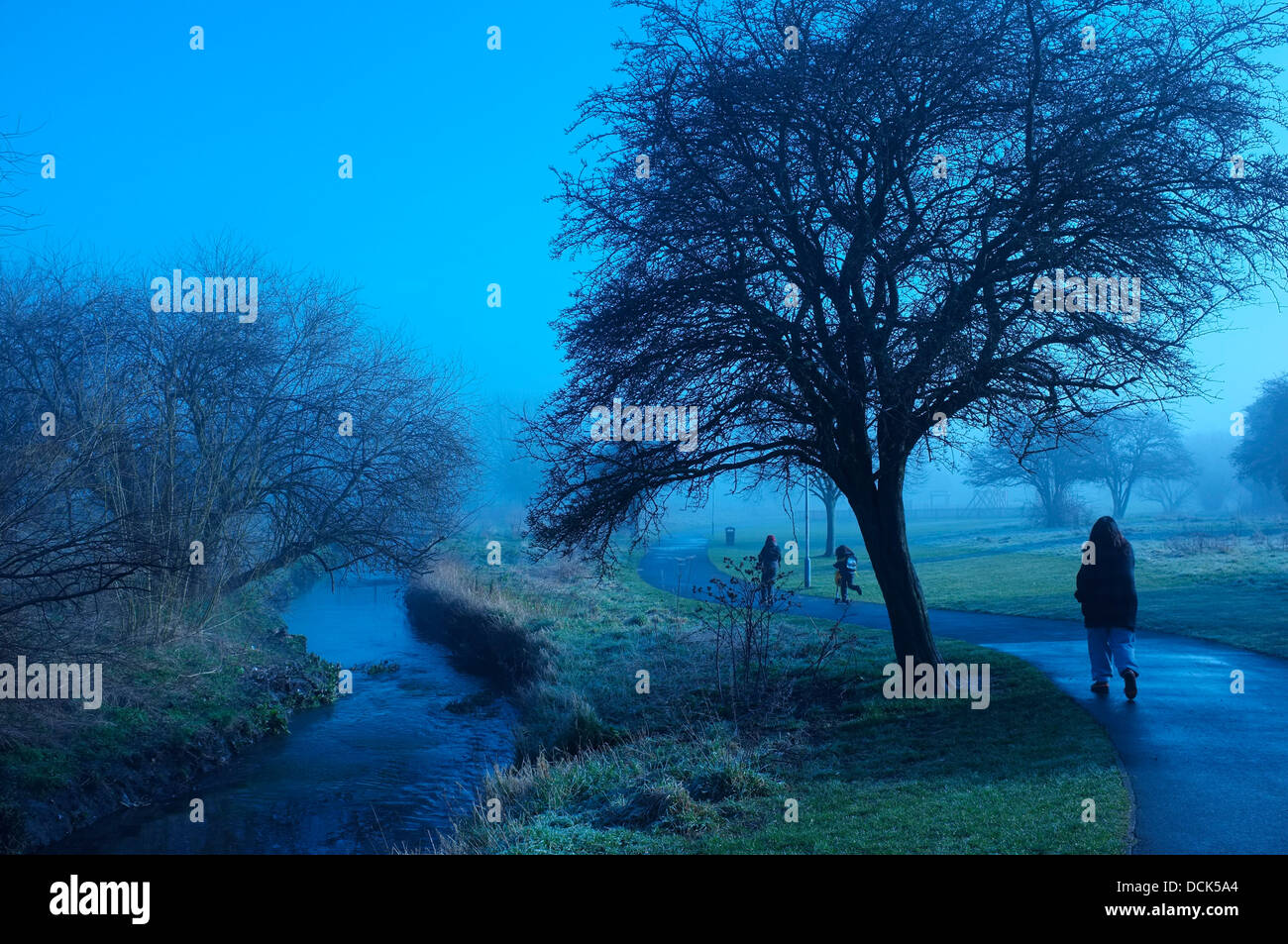 Walking through park on misty hi-res stock photography and images - Alamy