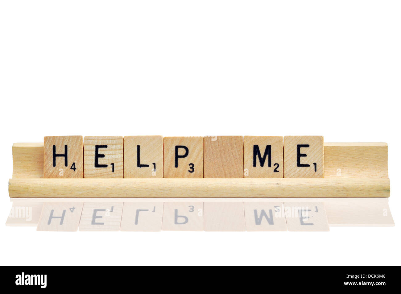 Help me in game wooden letters Stock Photo - Alamy