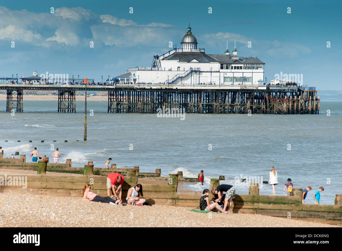 The beach and pier at the English coastal town of Eastbourne, in the ...