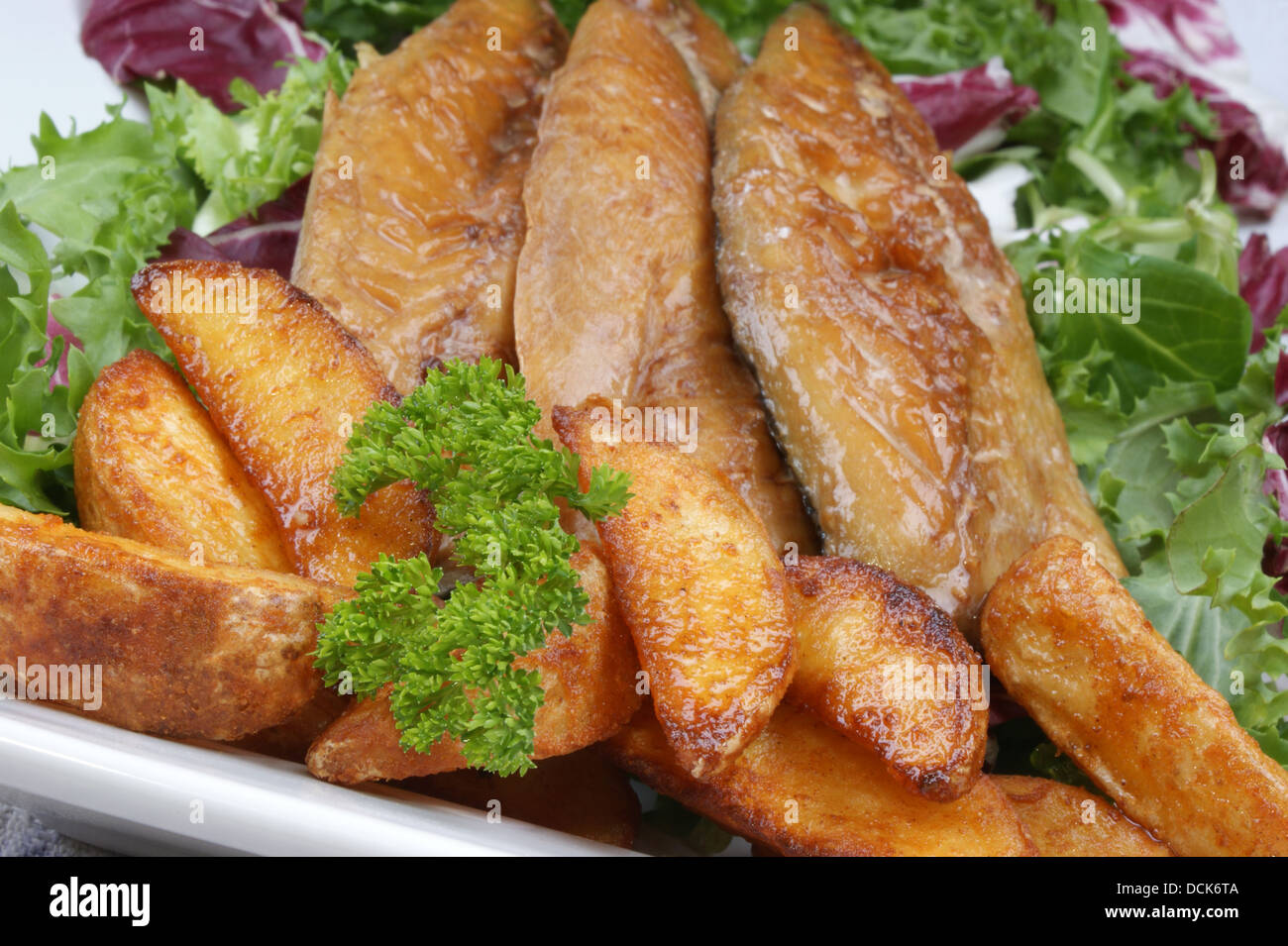 Grilled fish with potato wedges hi-res stock photography and images - Alamy