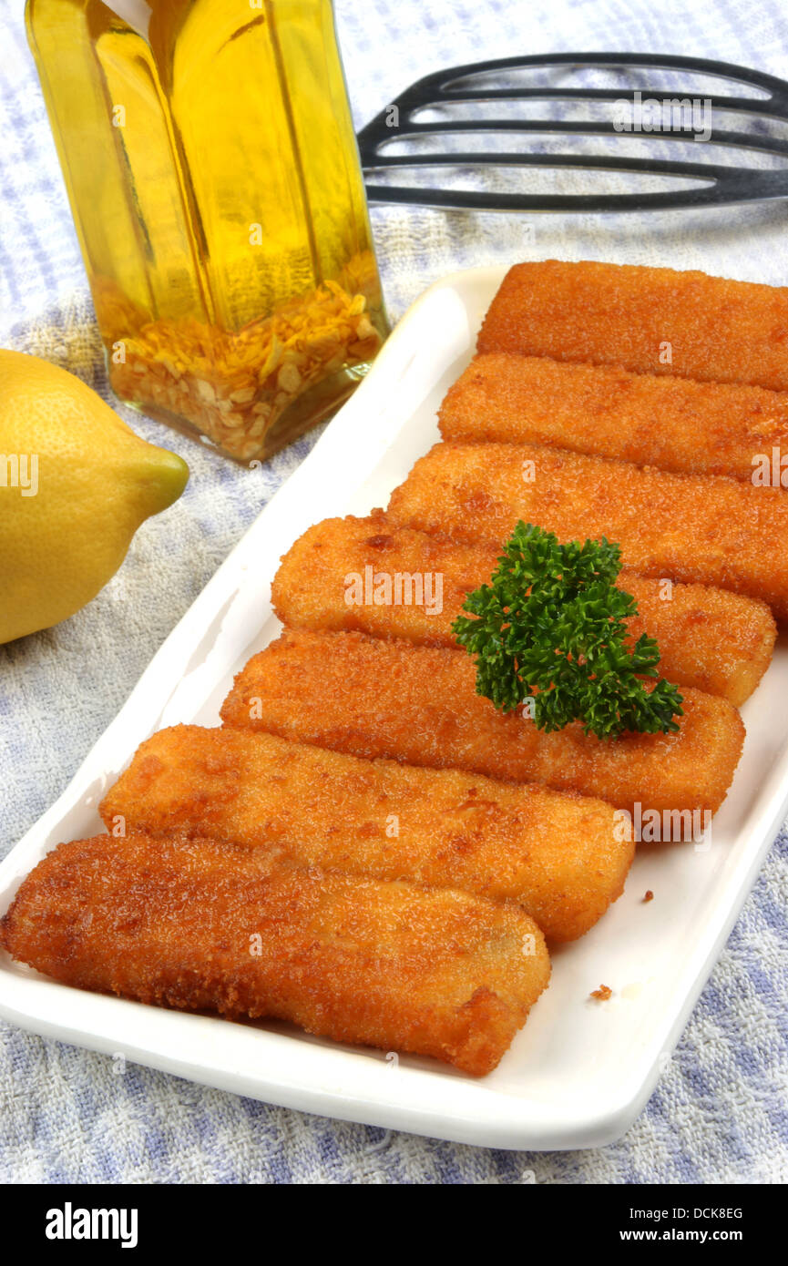 fried fish sticks on a white plate Stock Photo - Alamy