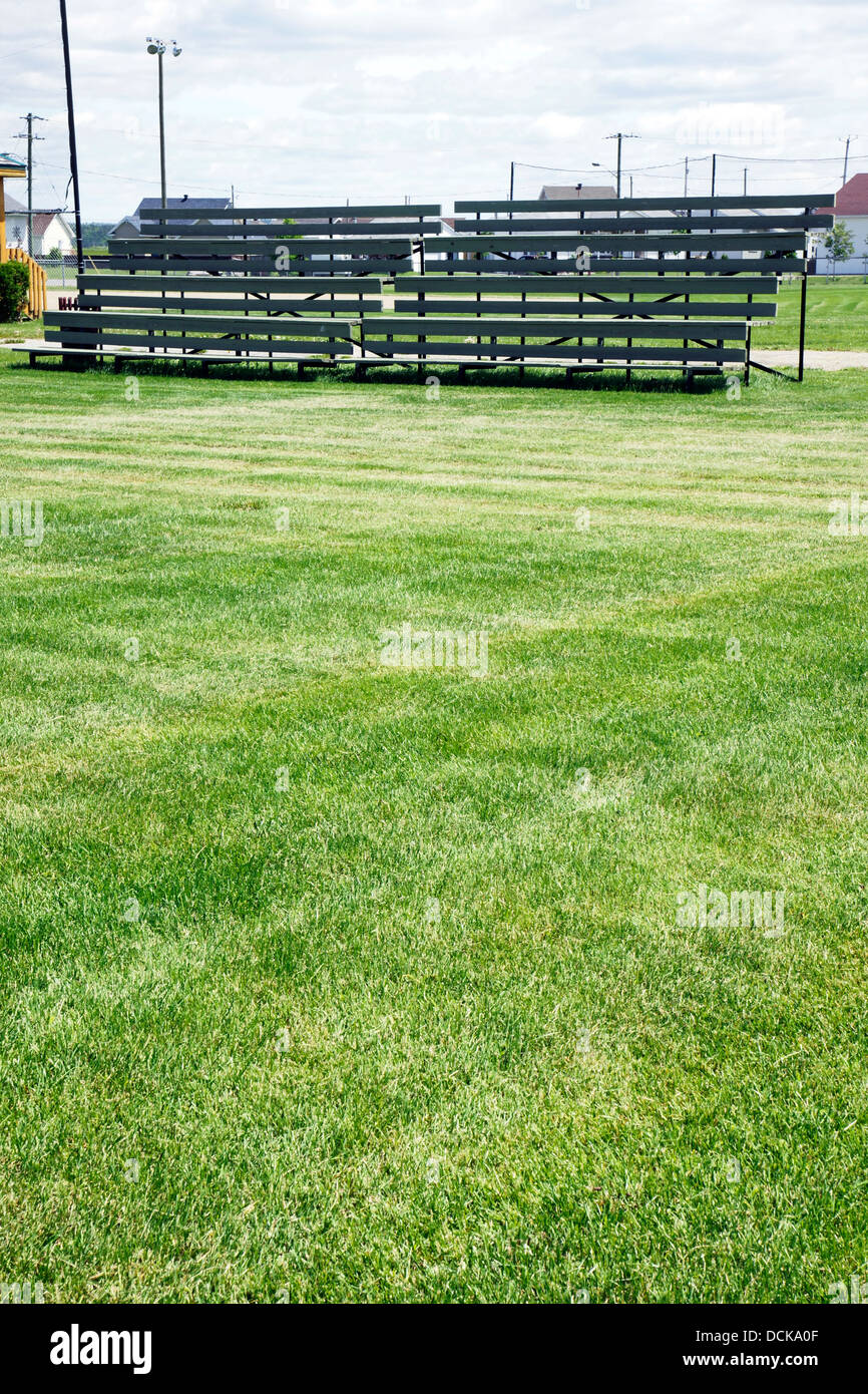 Bleachers and grass Stock Photo - Alamy