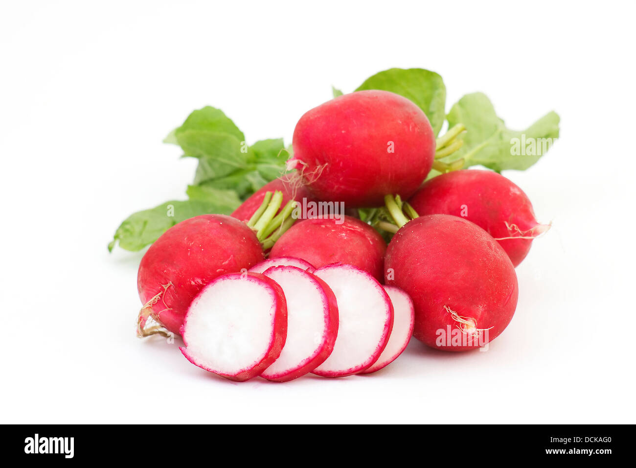 Fresh radishes on a white background Stock Photo - Alamy