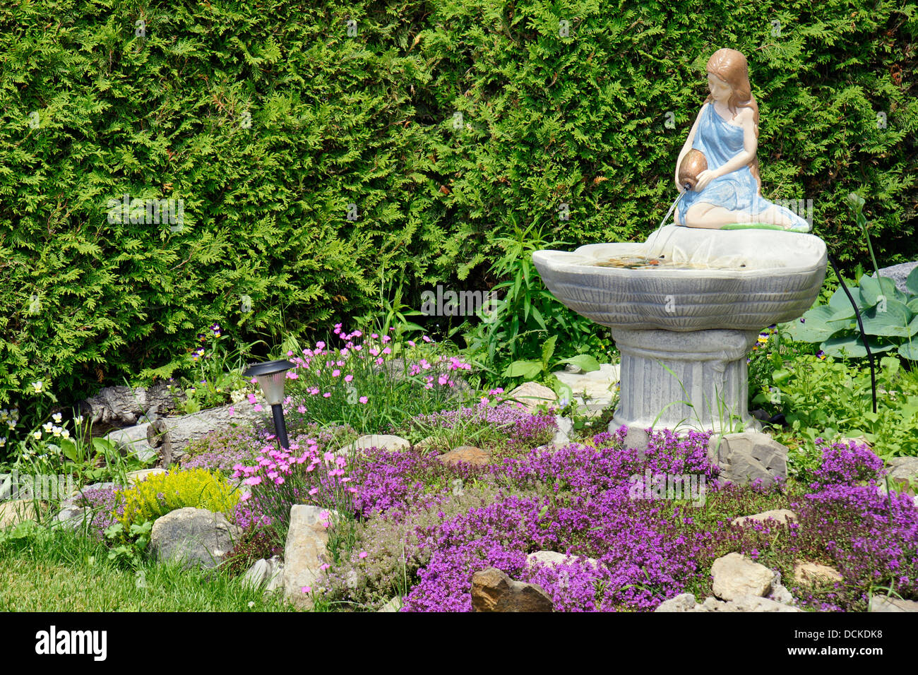 Statue woman pouring water fountain hi-res stock photography and images ...
