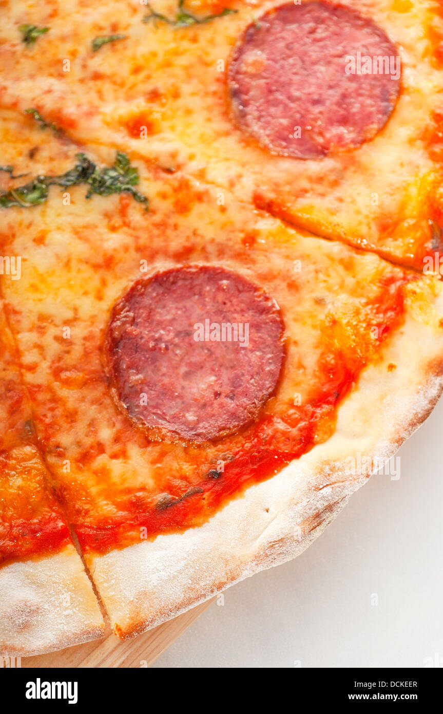 Italian original thin crust pepperoni pizza Stock Photo - Alamy