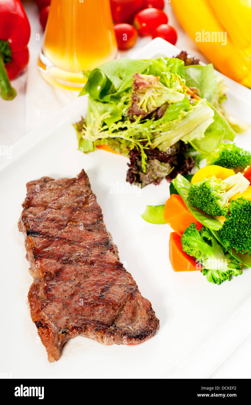 juicy BBQ grilled rib eye ,ribeye steak and vegetables Stock Photo - Alamy