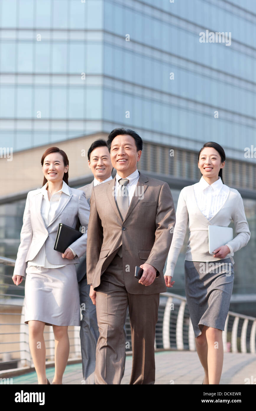 Professional business team on the move Stock Photo - Alamy