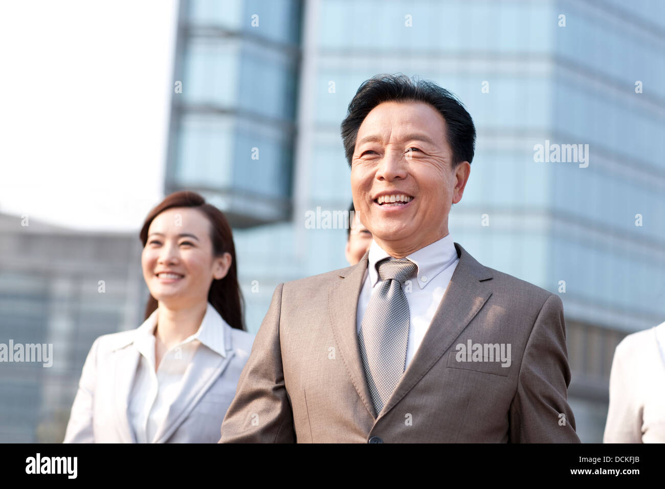 Professional business team on the move Stock Photo - Alamy