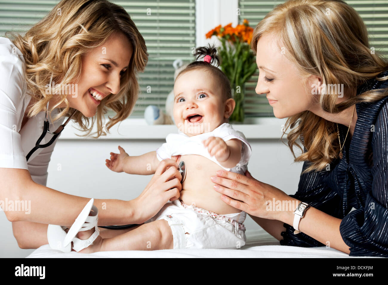 Doctor healthy baby Stock Photo - Alamy