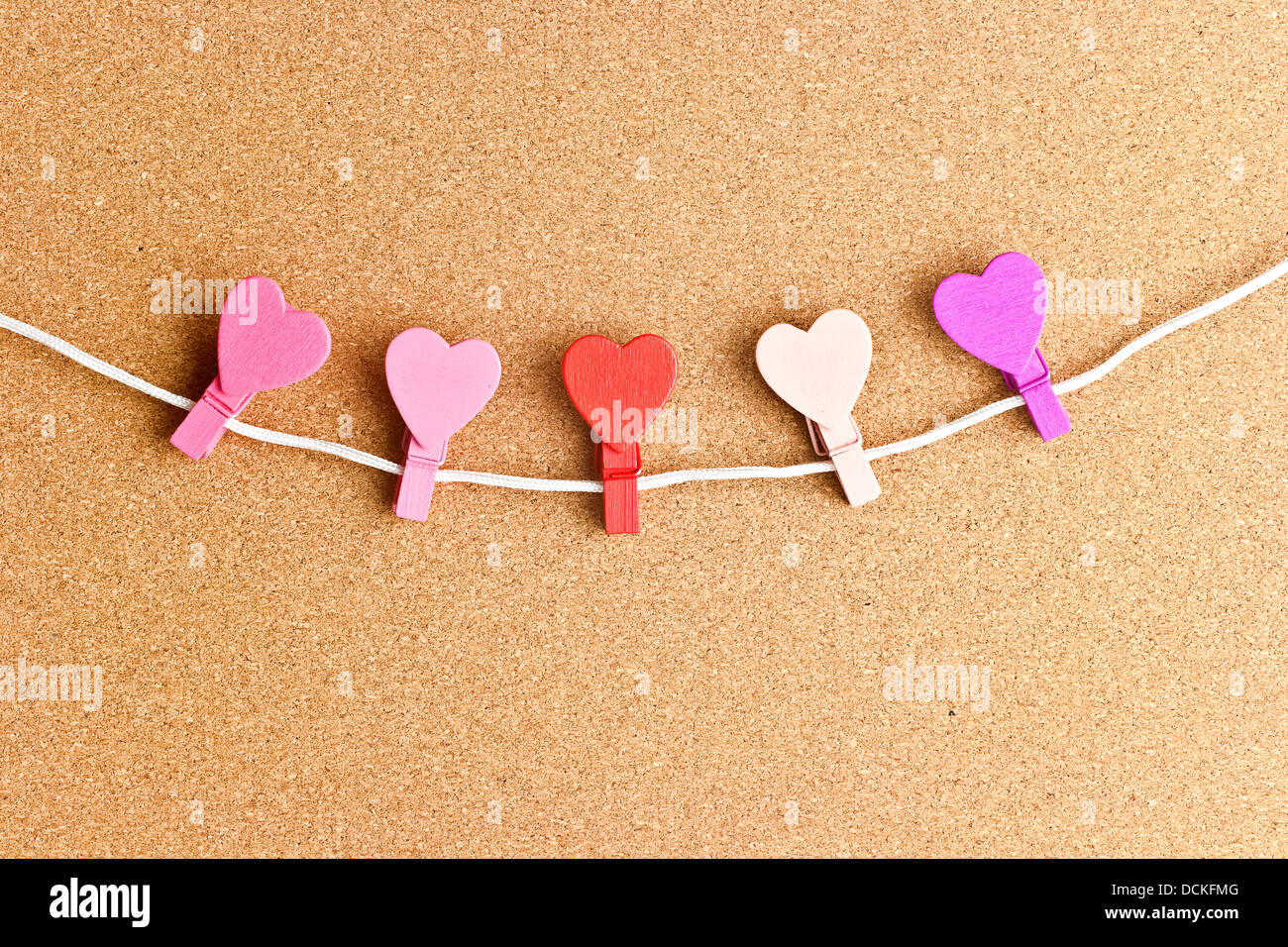 Hearts on the bulletin board Stock Photo - Alamy