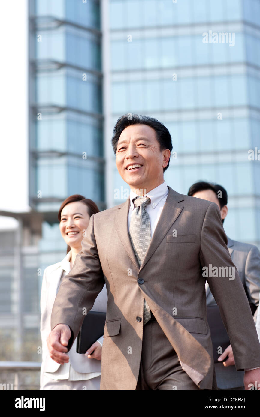 Professional business team on the move Stock Photo - Alamy