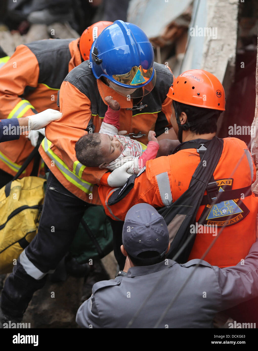 Sao Paulo, southeastern Brazil. 19th Aug, 2013. Firefighters pull child ...