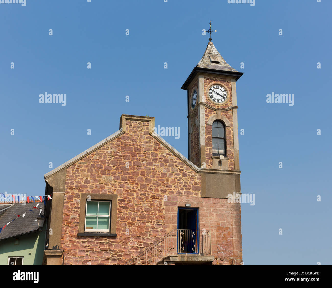 Clock tower in blue sky at Kingsand Cornwall England uk Stock Photo - Alamy