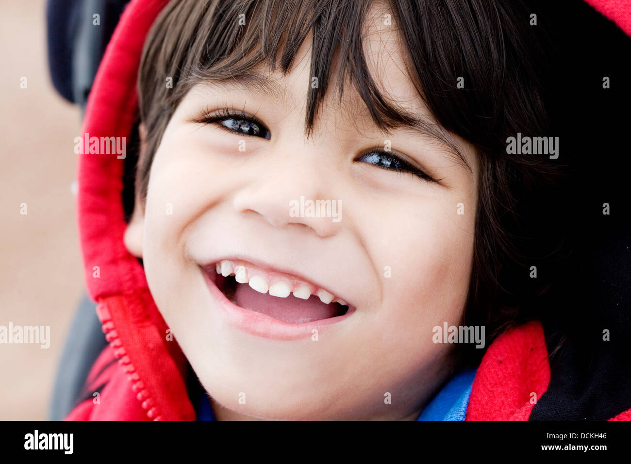 Handsome little boy smiling, closeup Stock Photo - Alamy