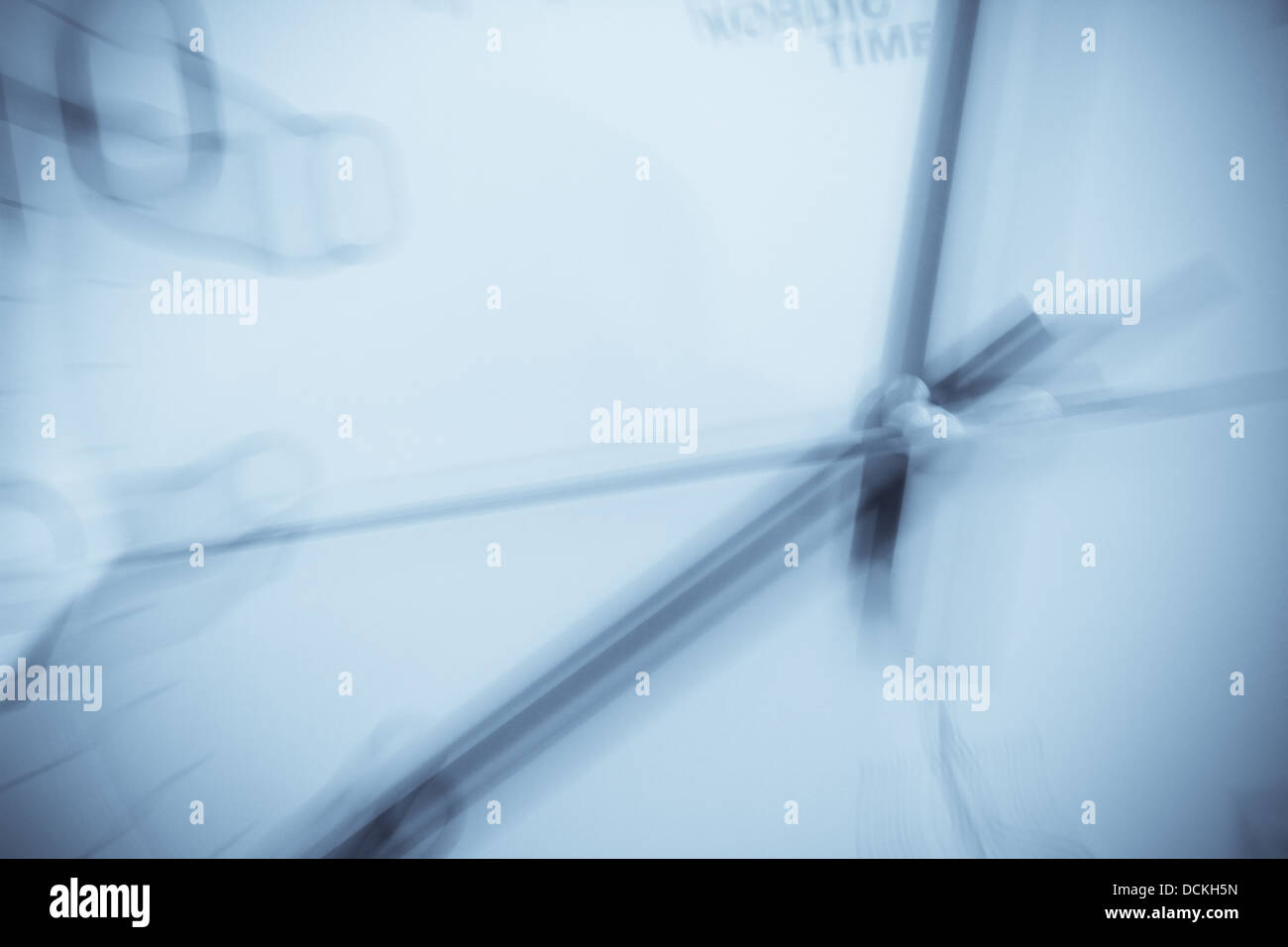 Blurry clock in blue Stock Photo - Alamy