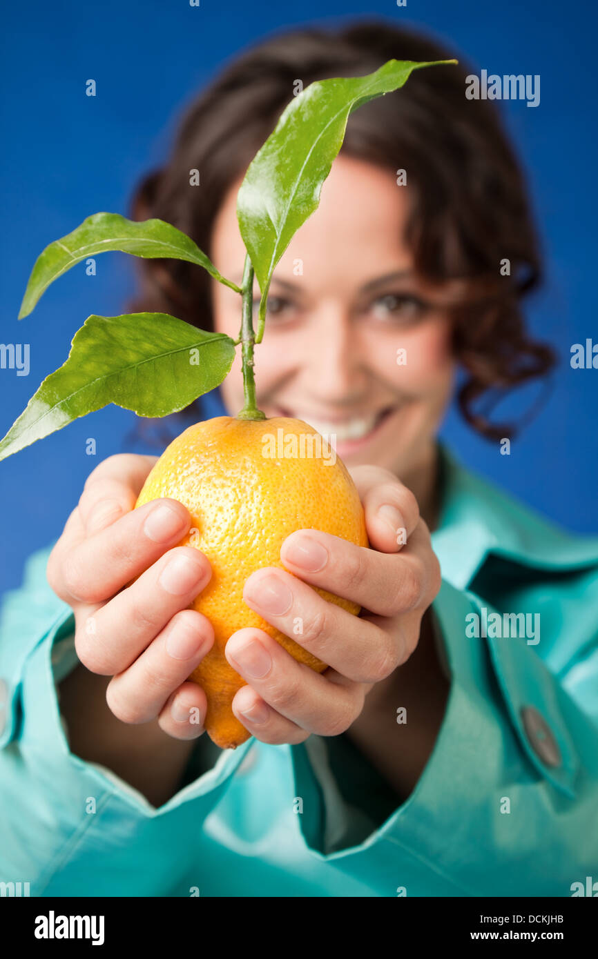 lemon hands woman Stock Photo - Alamy