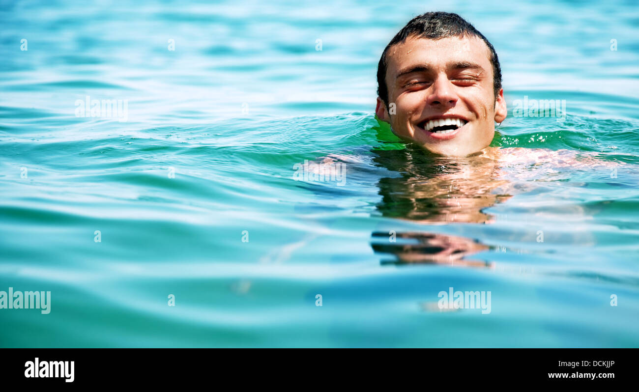 Man swimming in sea Stock Photo - Alamy
