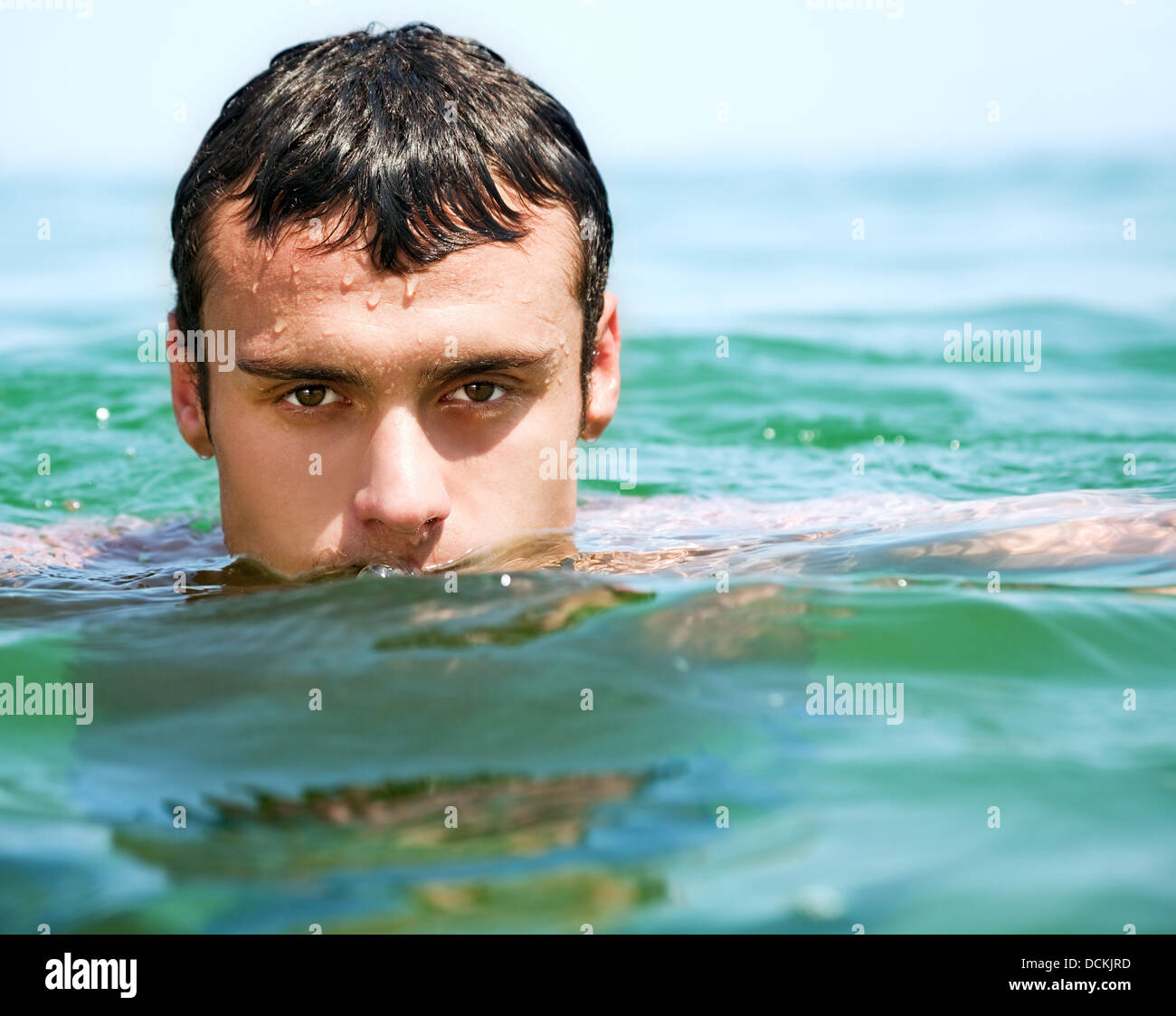 Man swimming sea Stock Photo - Alamy