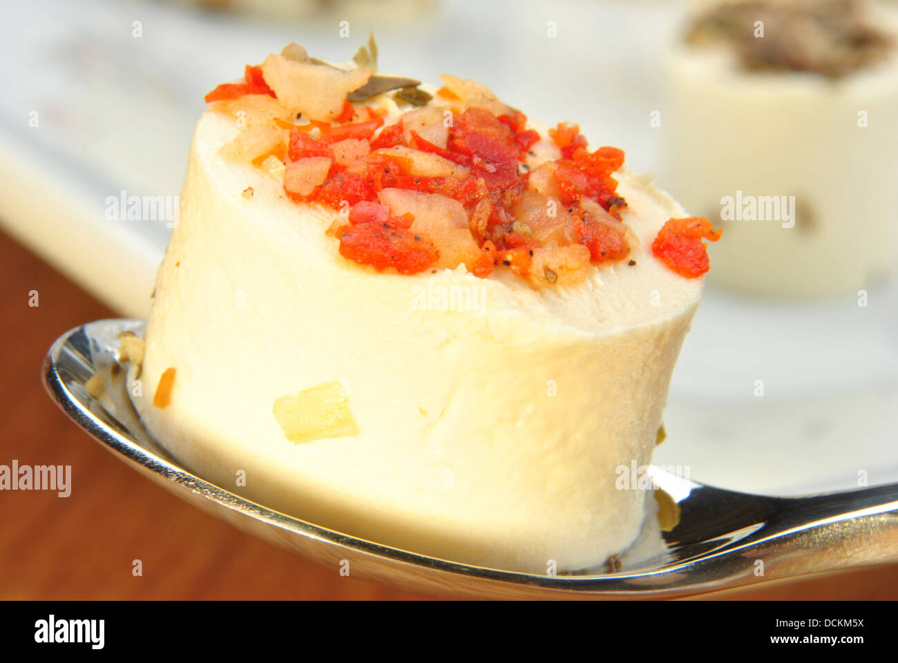organic goat cheese with italian style spices Stock Photo - Alamy
