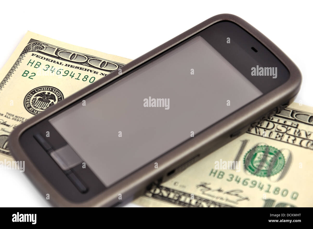 touchscreen mobile phone and dollar Stock Photo - Alamy