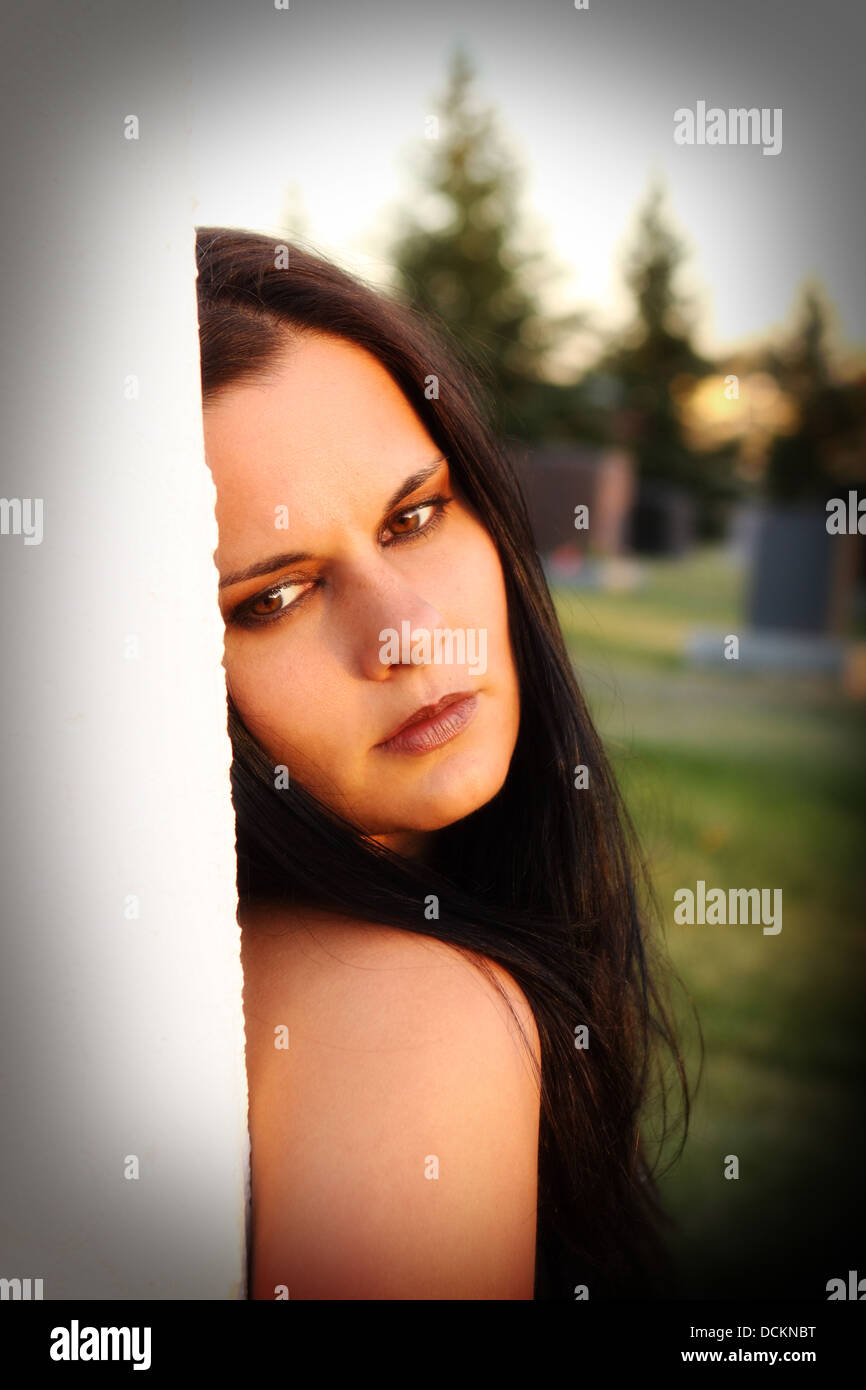 Sad Woman in Cemetery Stock Photo - Alamy