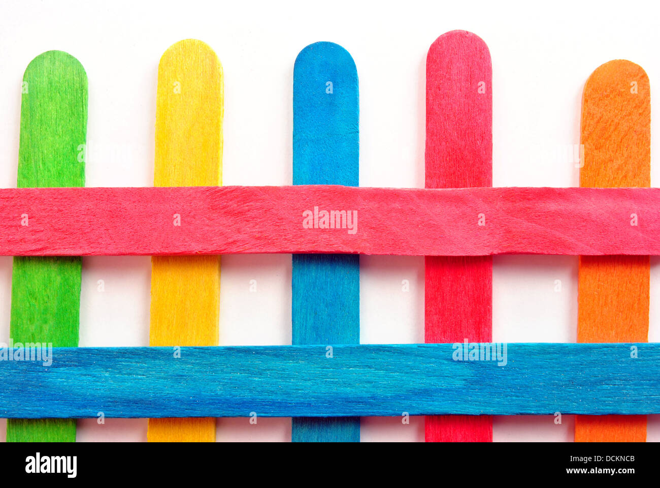 yellow blue orange green red timber sticks Stock Photo - Alamy