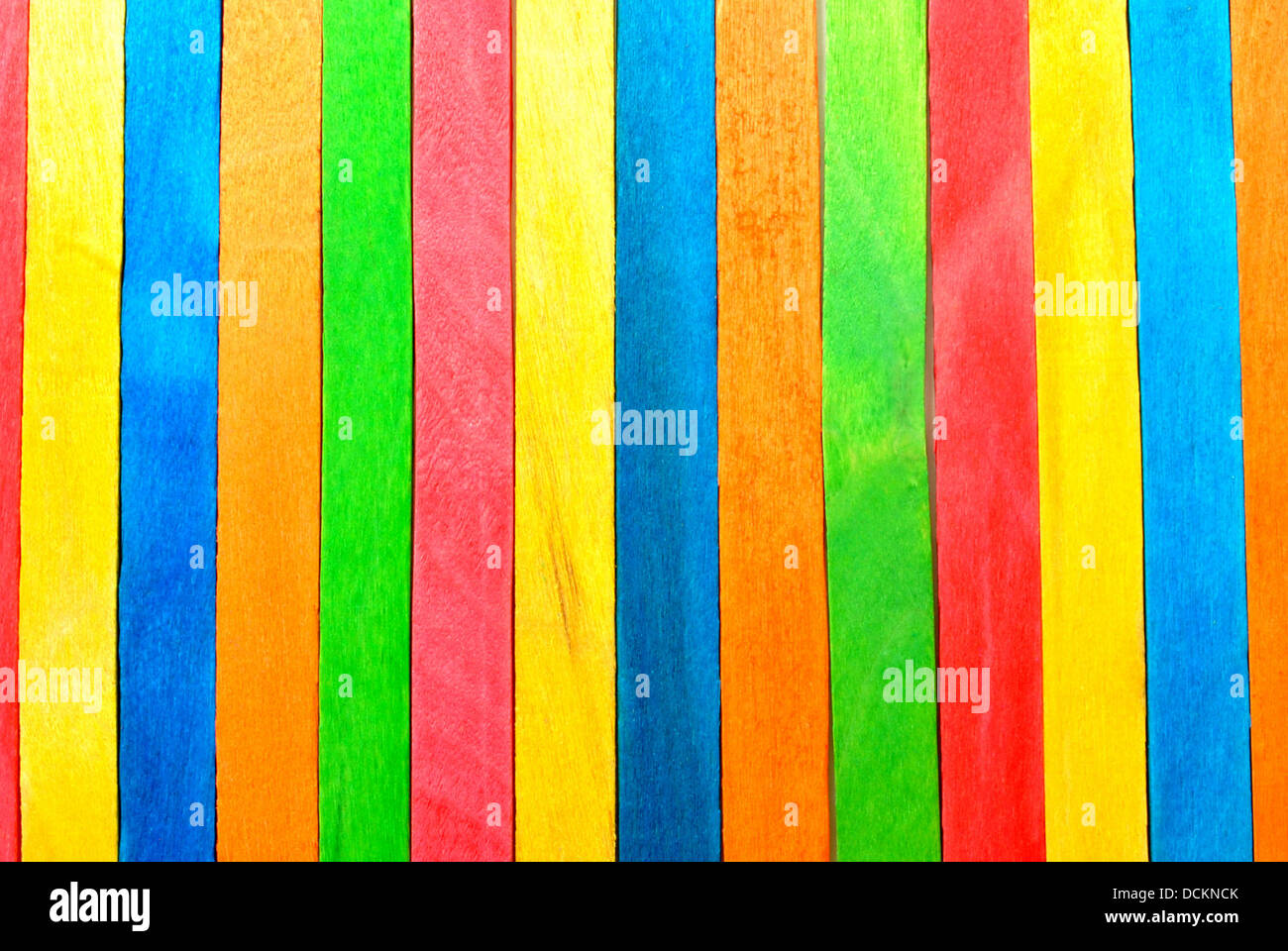 yellow blue orange green red timber sticks Stock Photo - Alamy