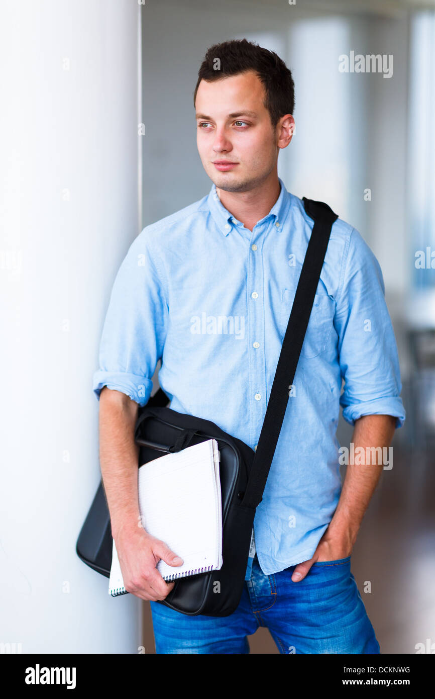 Handsome college student on campus Stock Photo - Alamy