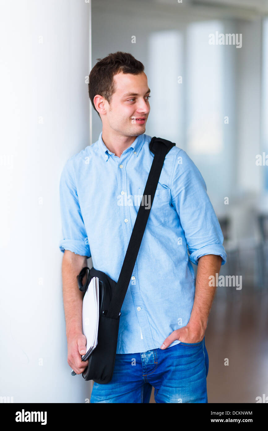 Handsome college student on campus Stock Photo - Alamy