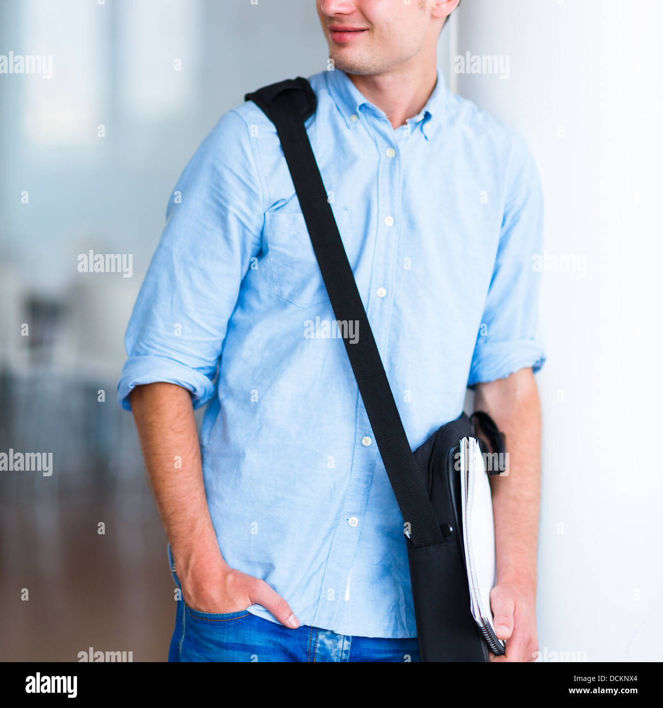Handsome college student on campus Stock Photo - Alamy