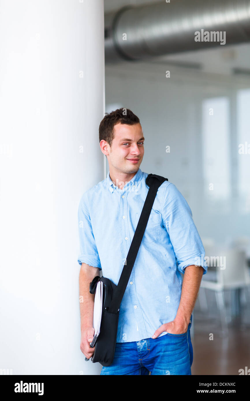Handsome college student on campus Stock Photo - Alamy