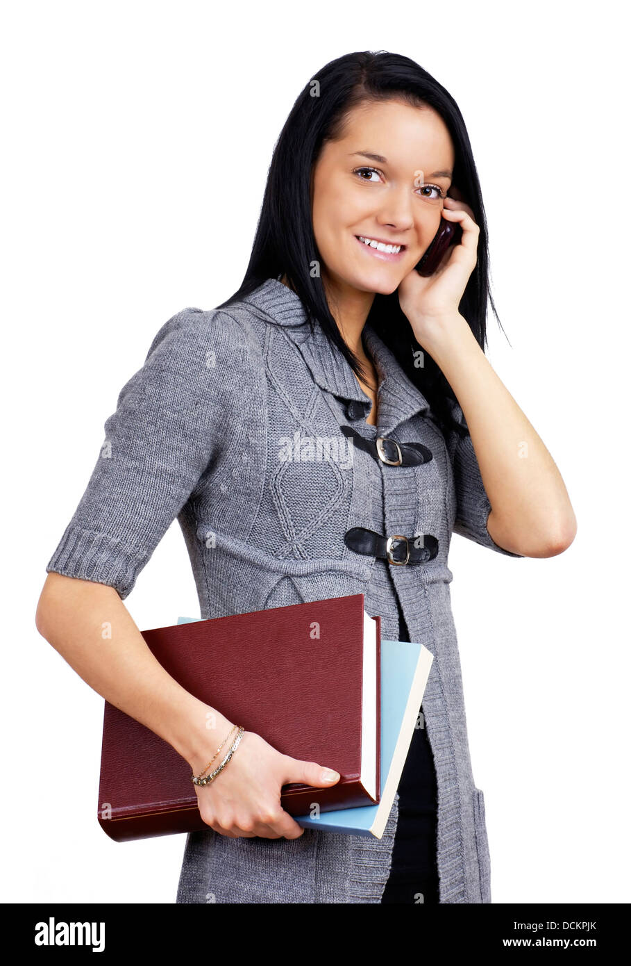 Student with books and phone Stock Photo - Alamy