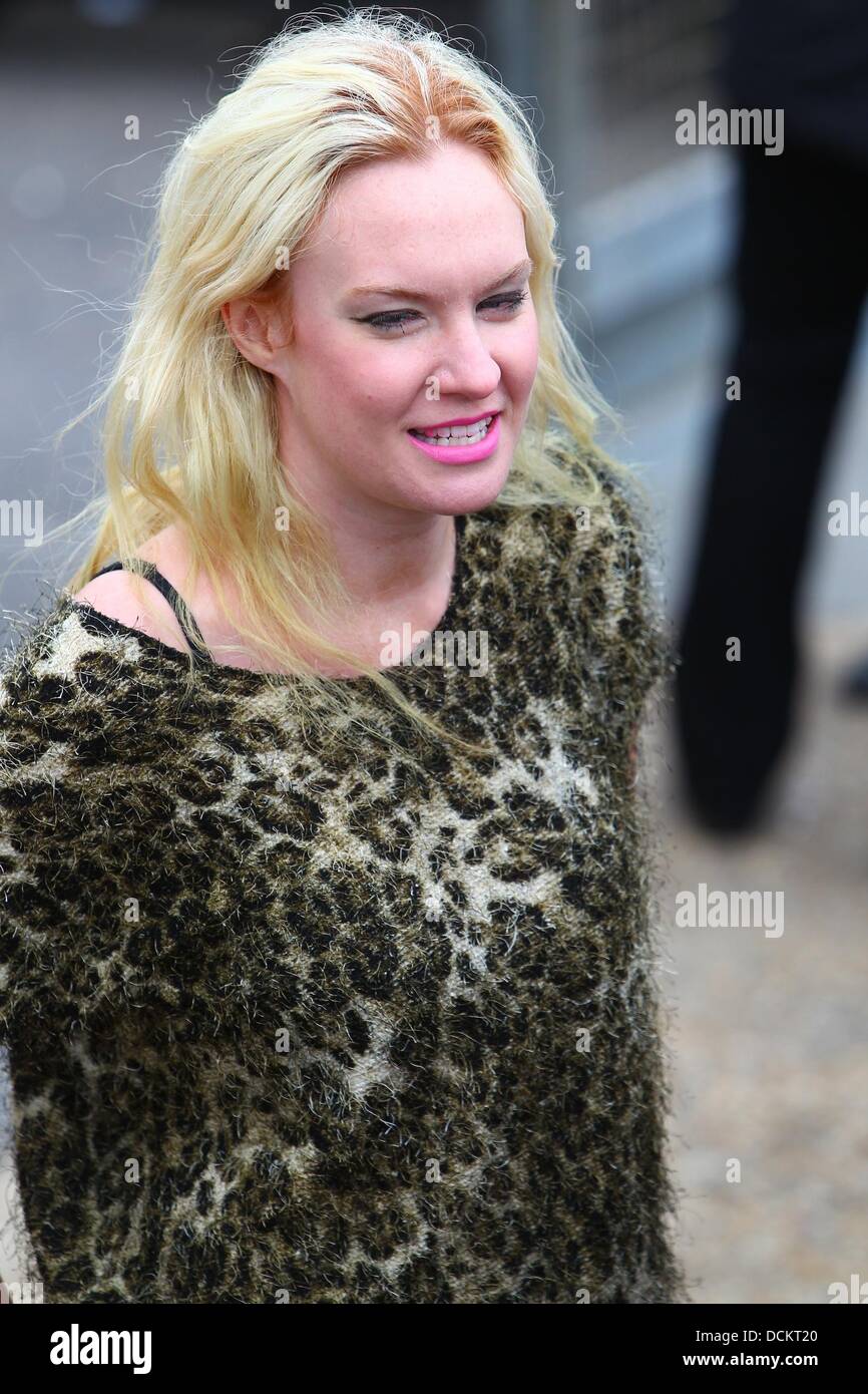 X Factor' finalist Kitty Brucknell displays lipstick on her teeth as ...