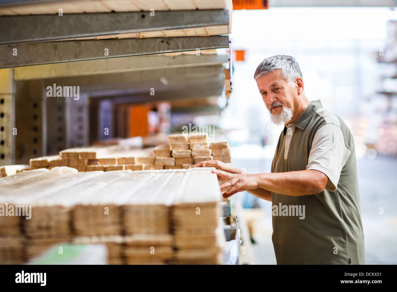 Man buying construction wood in a DIY store Stock Photo - Alamy