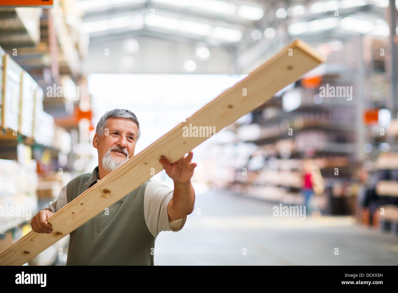 Man buying construction wood in a DIY store Stock Photo - Alamy