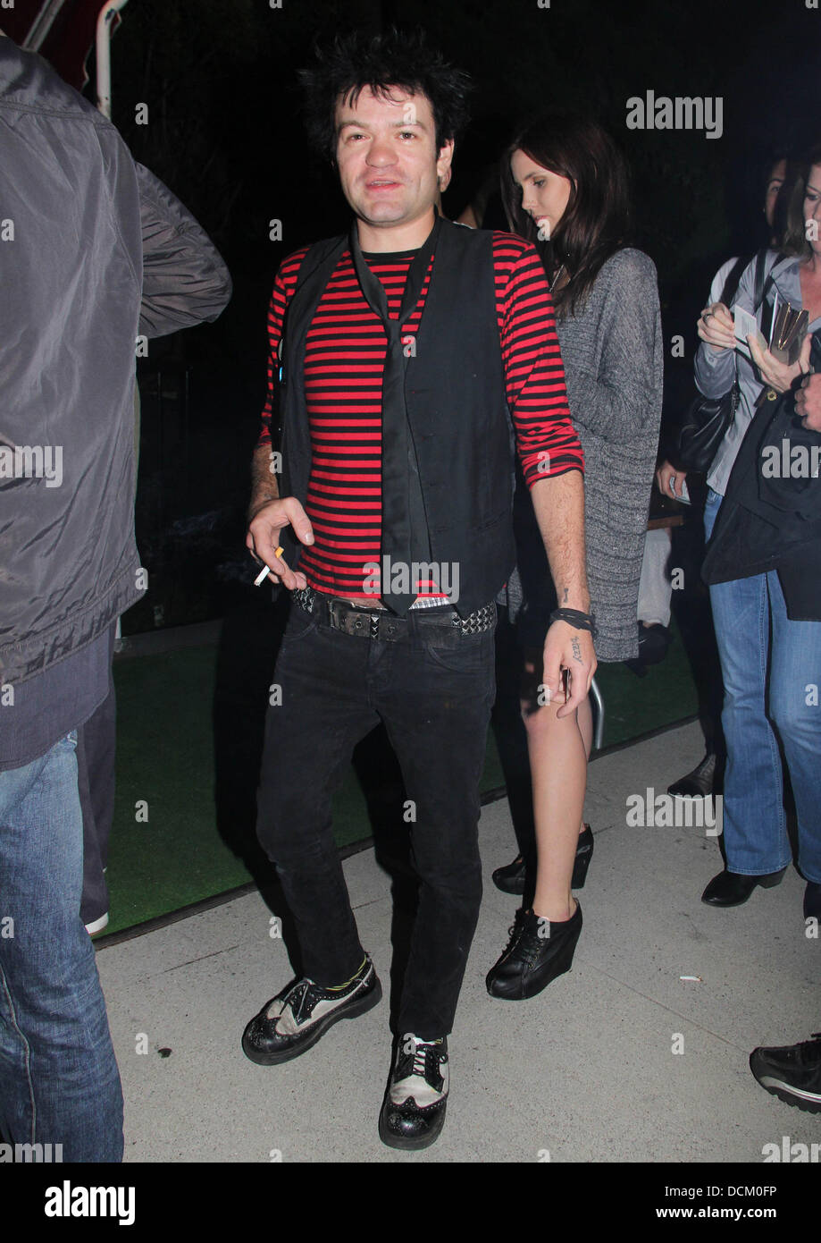 Deryck Whibley Celebrities arrive to watch the Foo Fighters in concert ...