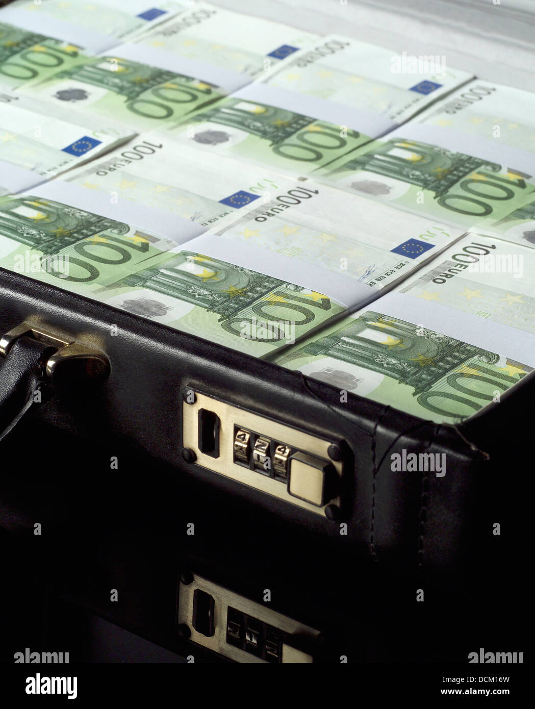 Briefcase with money Stock Photo - Alamy