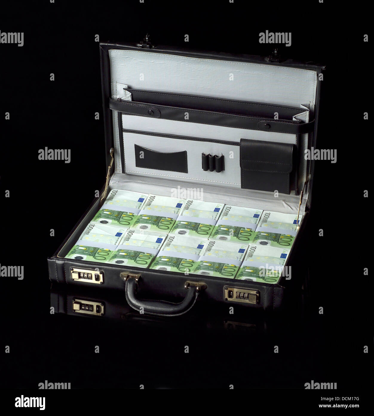 Briefcase with money Stock Photo - Alamy