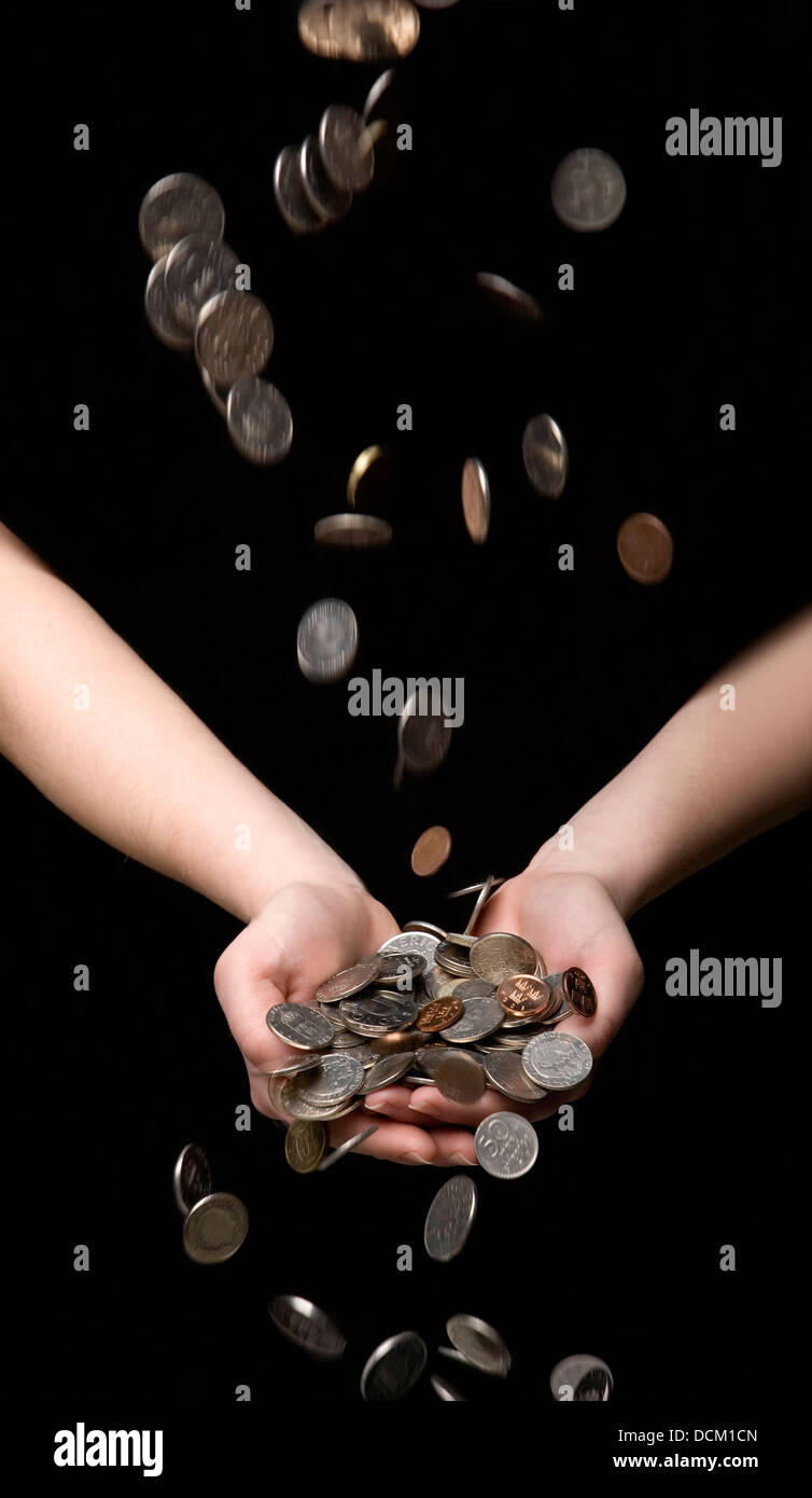Raining coins hi-res stock photography and images - Alamy