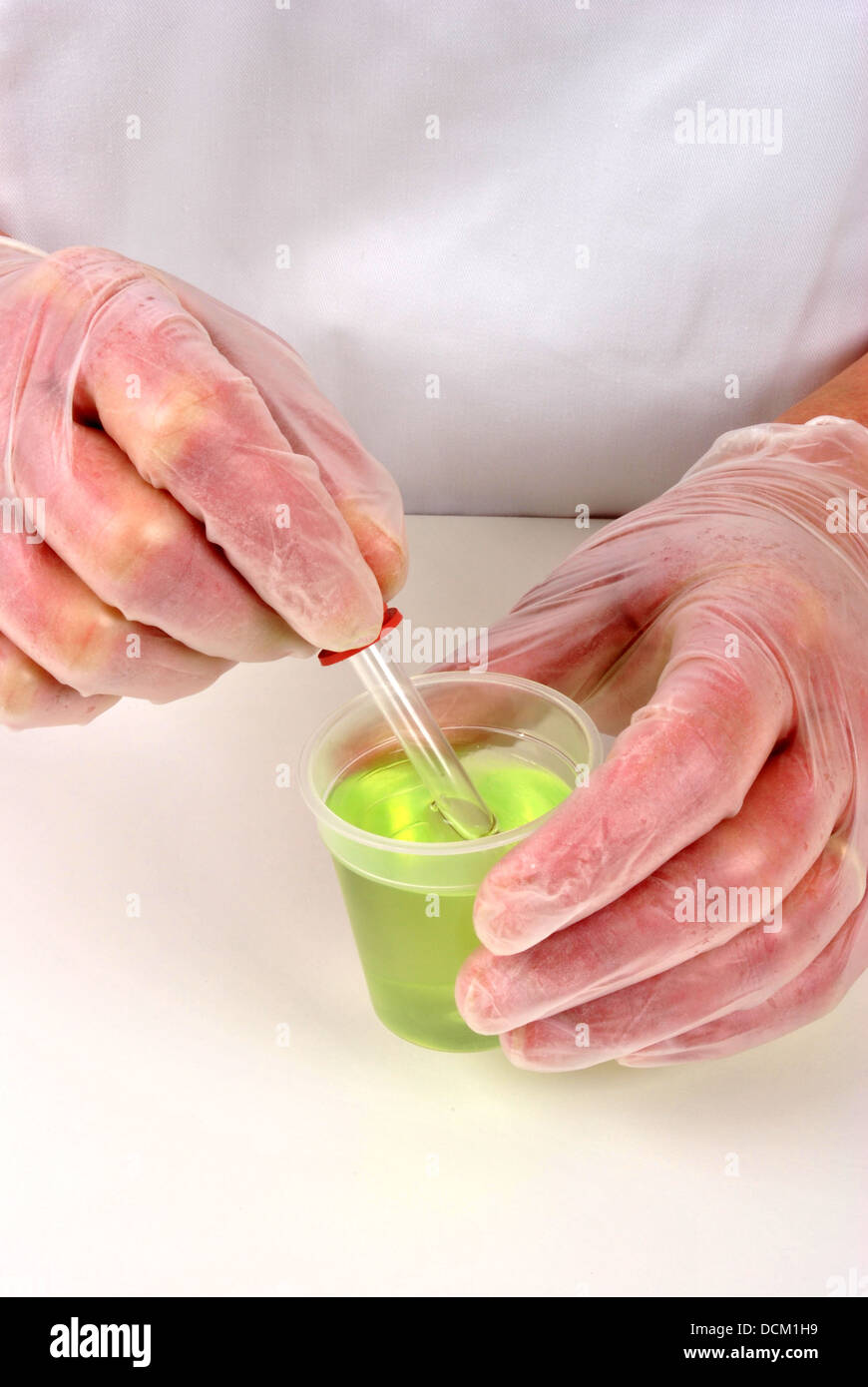 some liquid in a measuring cup Stock Photo - Alamy