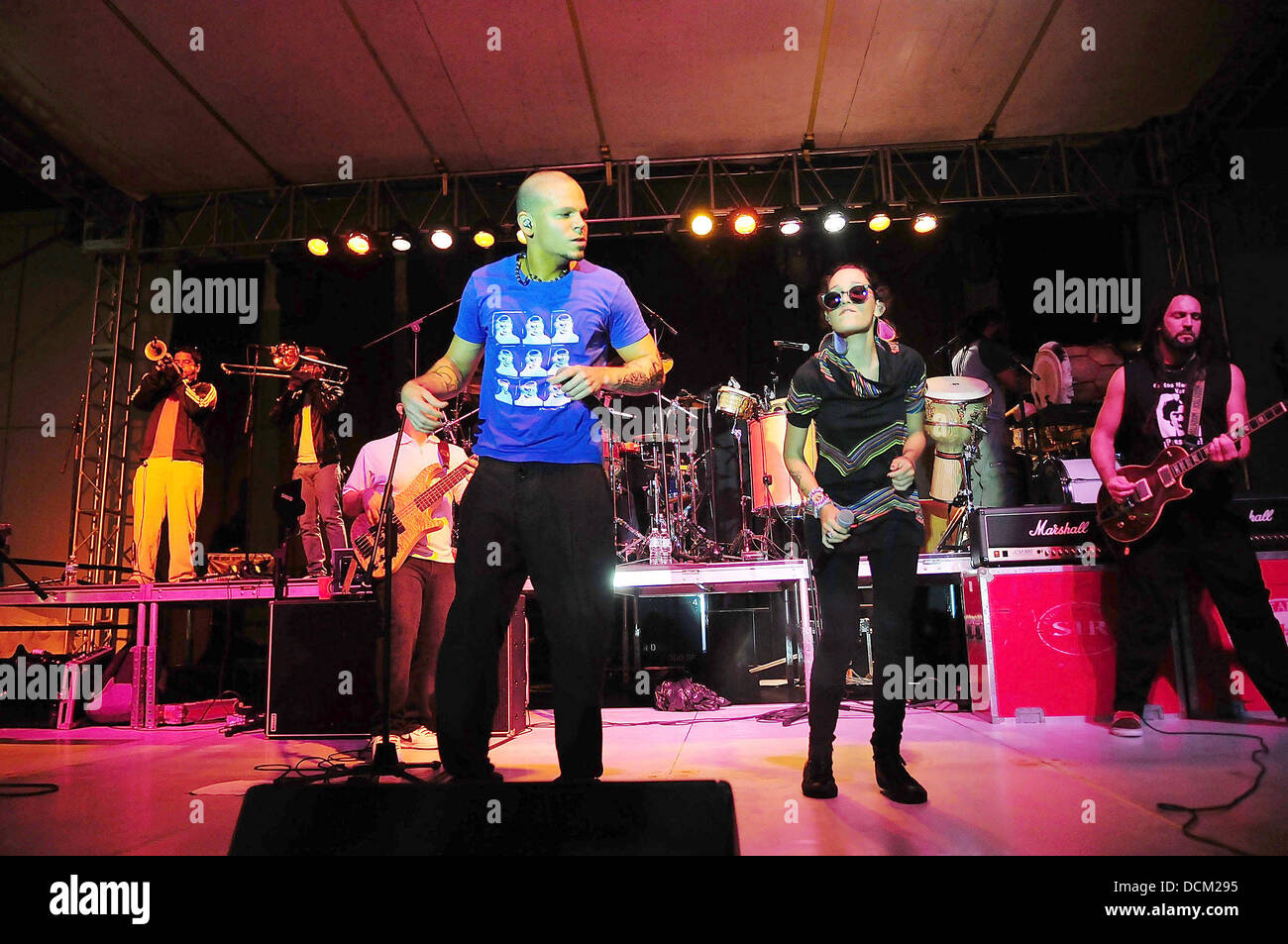 Rene Perez Joglar aka Residente (L) and Ileana Cabra Joglar aka PG-13 ...