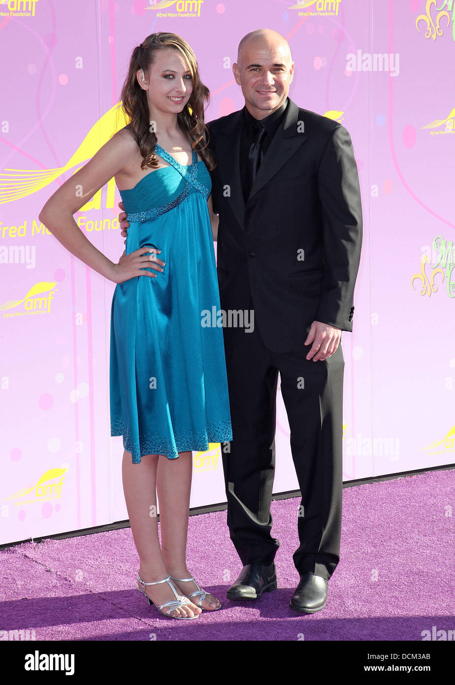 Skye Carter (L) and Andre Agassi The Alfred Mann Foundation's Annual ...