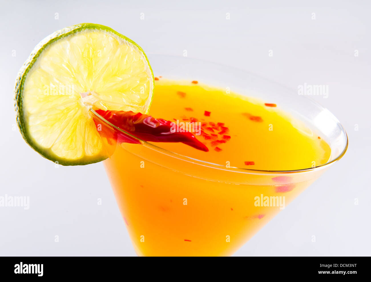 Alcoholic yellow cocktail Stock Photo - Alamy