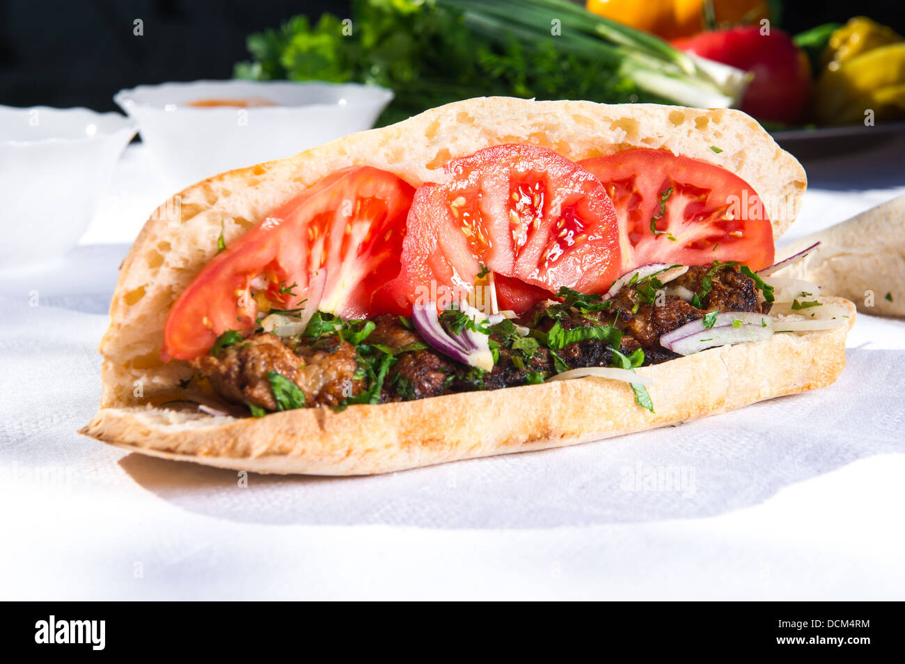 Lavash with grilled meat and vegetables Stock Photo - Alamy