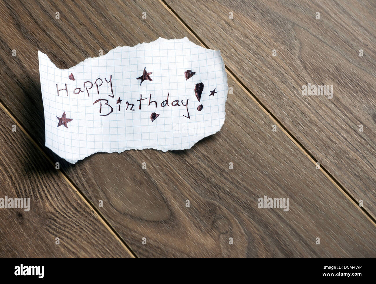 Happy Birthday - Hand writing text on wood background with space for ...