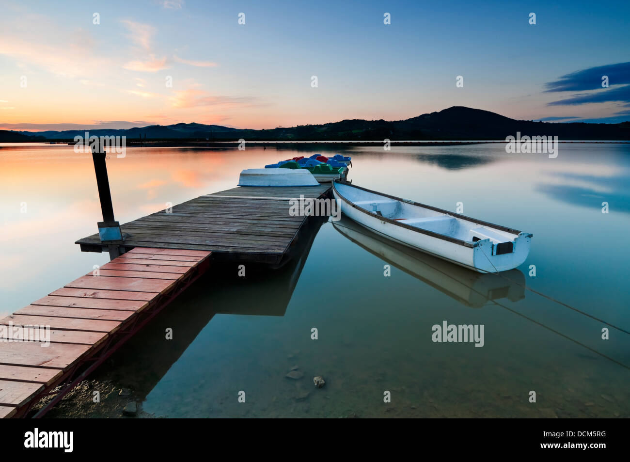 Fishing boat on water sunrise hi-res stock photography and images - Alamy