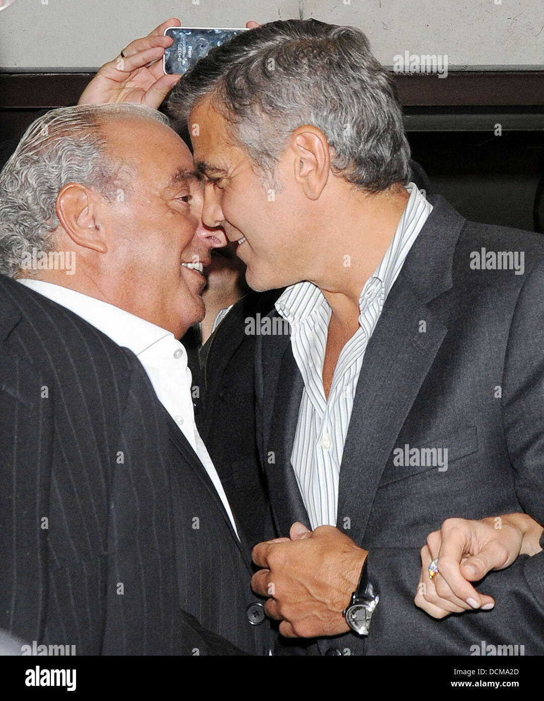 Sir Philip Green and George Clooney leaving China Tang Restaurant ...