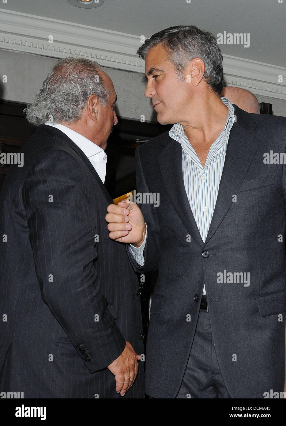 Sir Philip Green and George Clooney leaving China Tang Restaurant ...