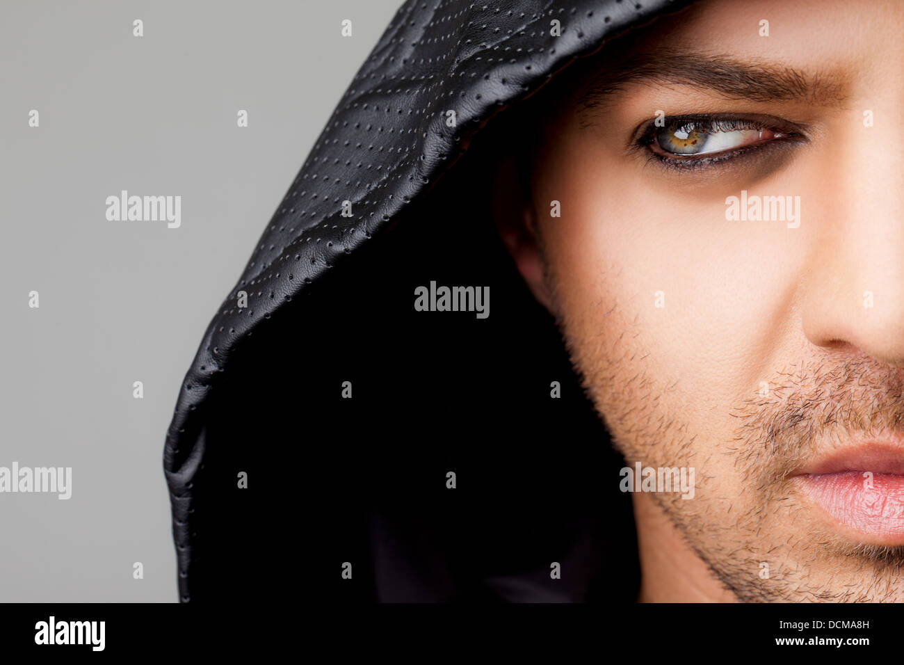 Half face man hood Stock Photo - Alamy